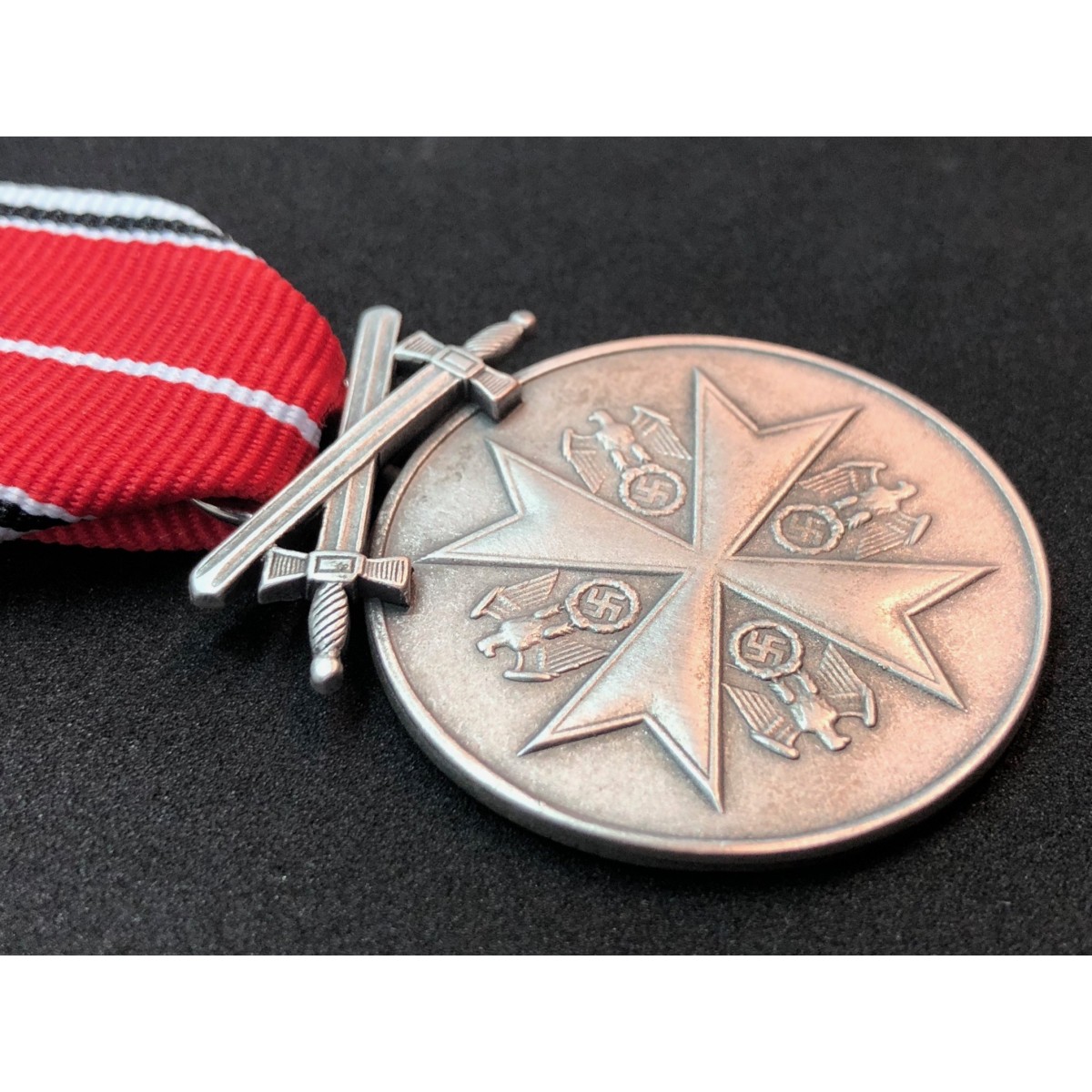 Repro German Merit Medal with Swords ww2 for reenactment.